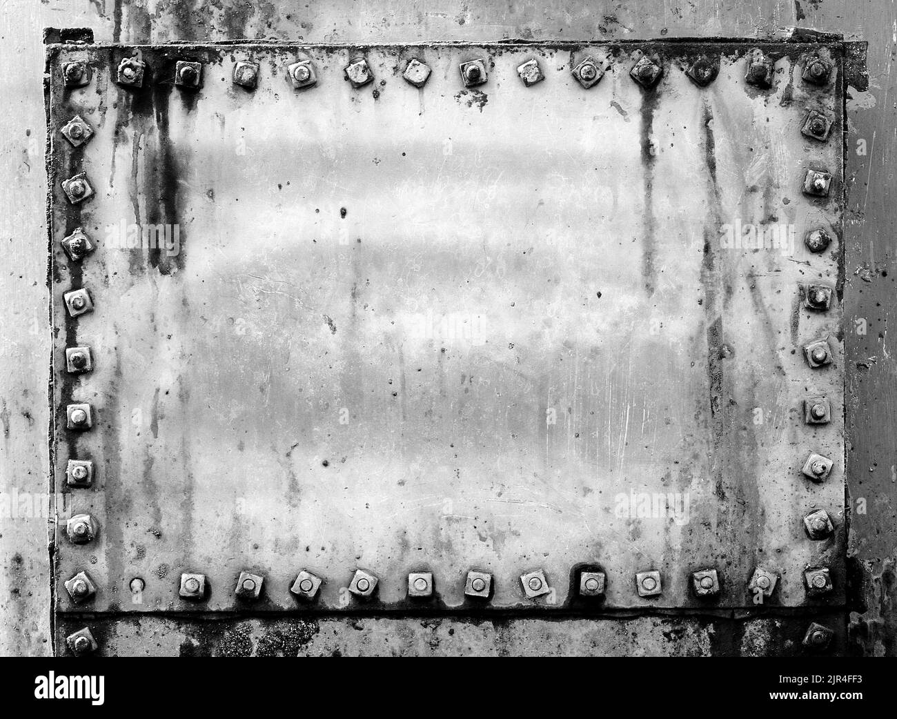 grunge background metal plate with screws Stock Photo - Alamy