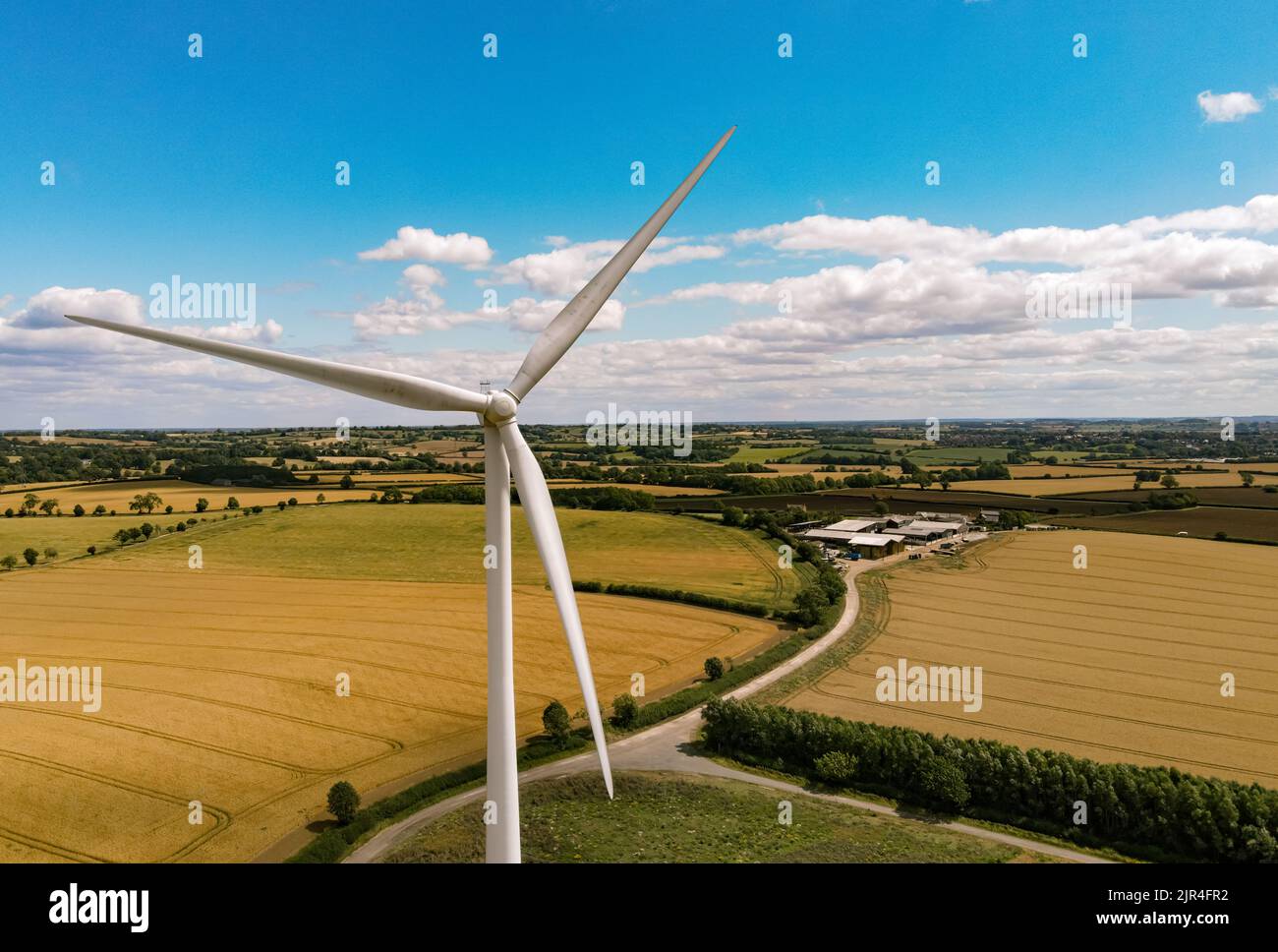 Wind turbines generating clean renewable energy Stock Photo - Alamy