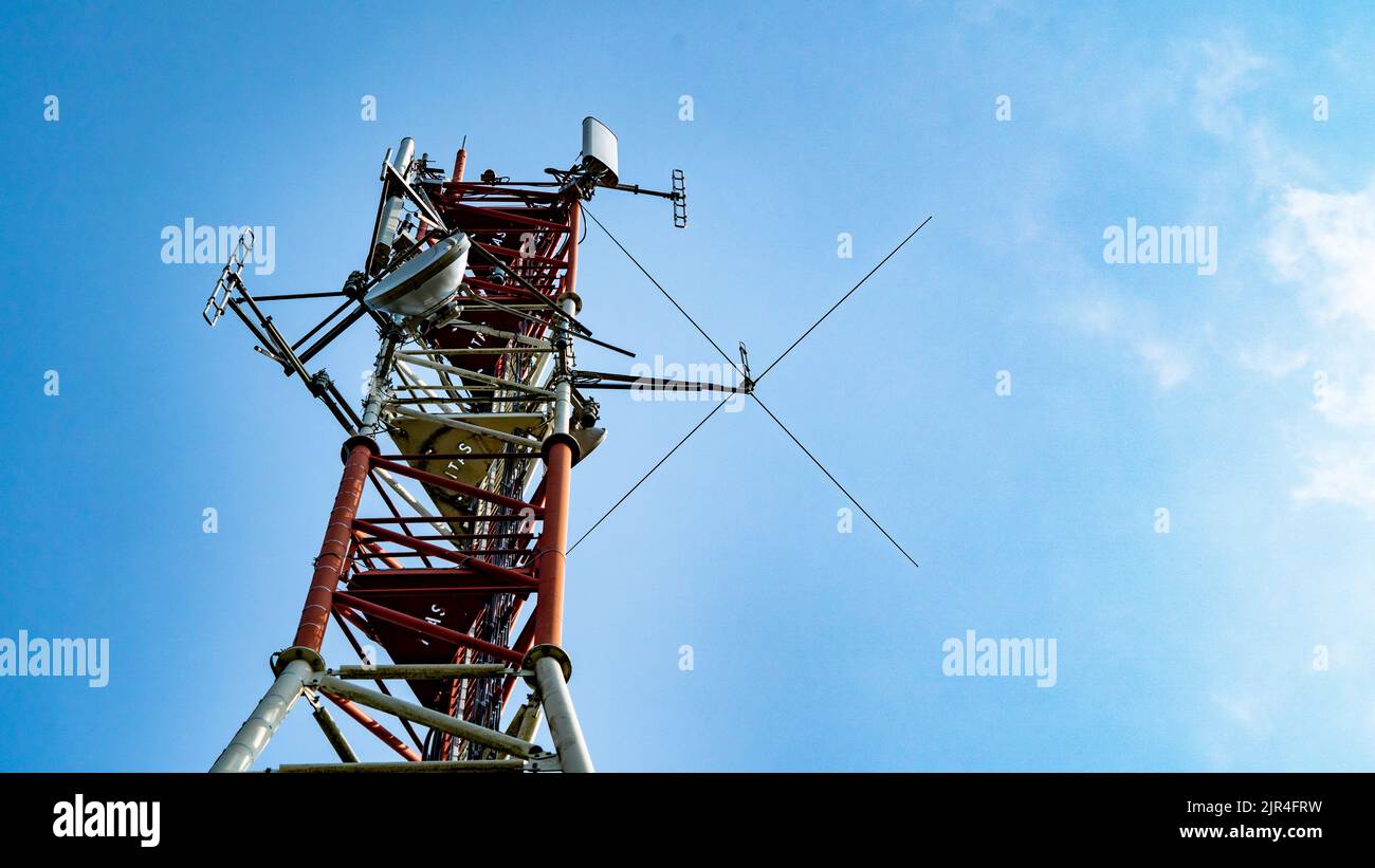 Tall red communication tower antennas hi-res stock photography and ...