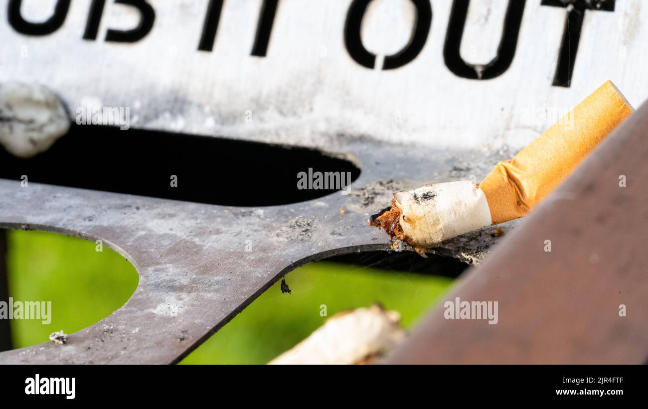 Close-Up of Cigarette Butt in “Stub It Out” Bin Stock Photo - Alamy