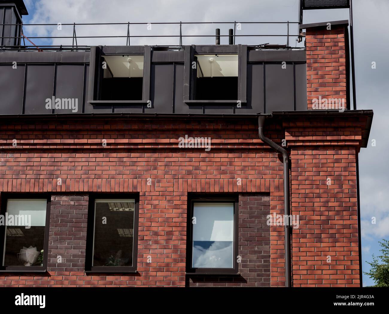 Modern building with red bricks. old architecture Stock Photo - Alamy