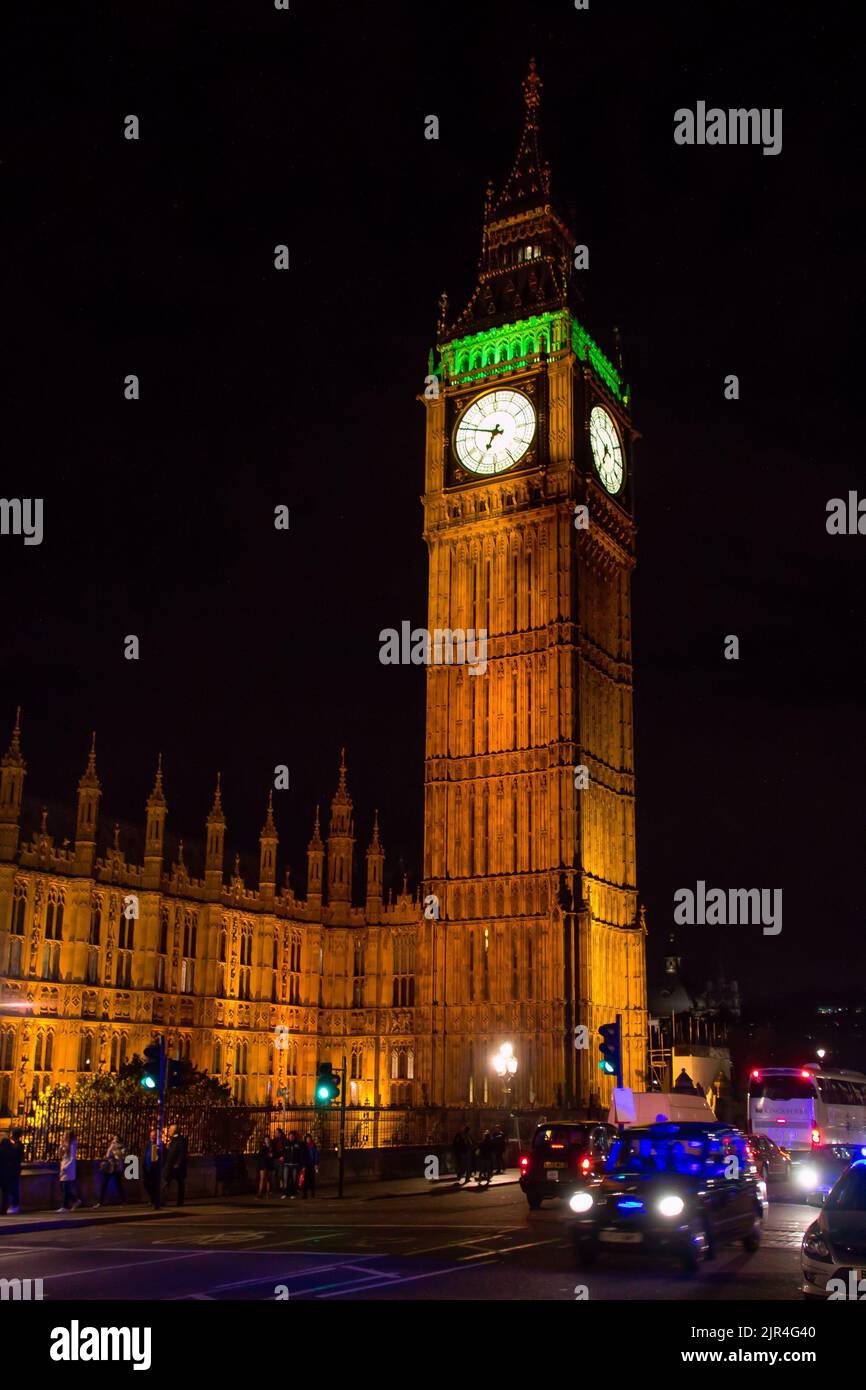 A vertical shot of the illuminated Big Ben building at night Stock ...