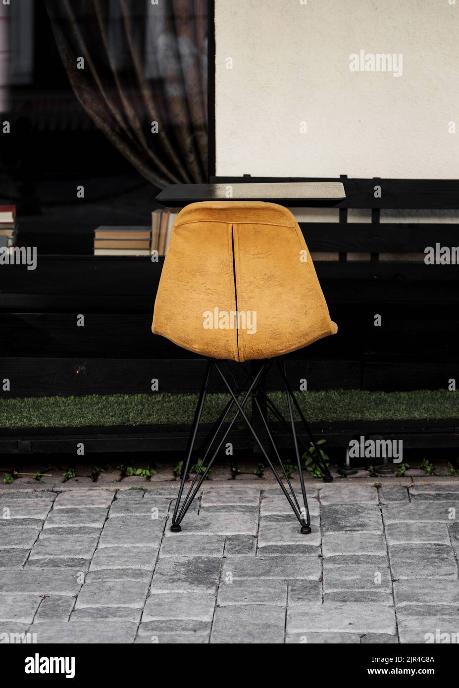 colored chair in street terrace. modern furniture. vivid armchair Stock ...