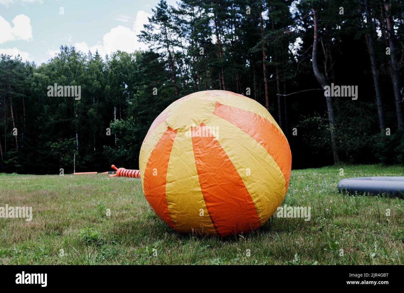 Big Single Colorful Inflatable ball on grass. beach ball Stock Photo ...
