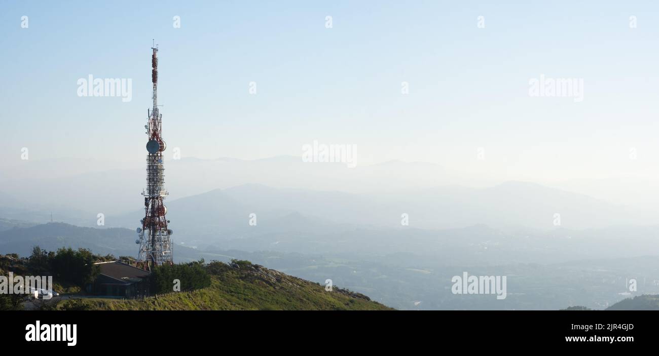 telecommunications tower with antennas for wireless communications with ...