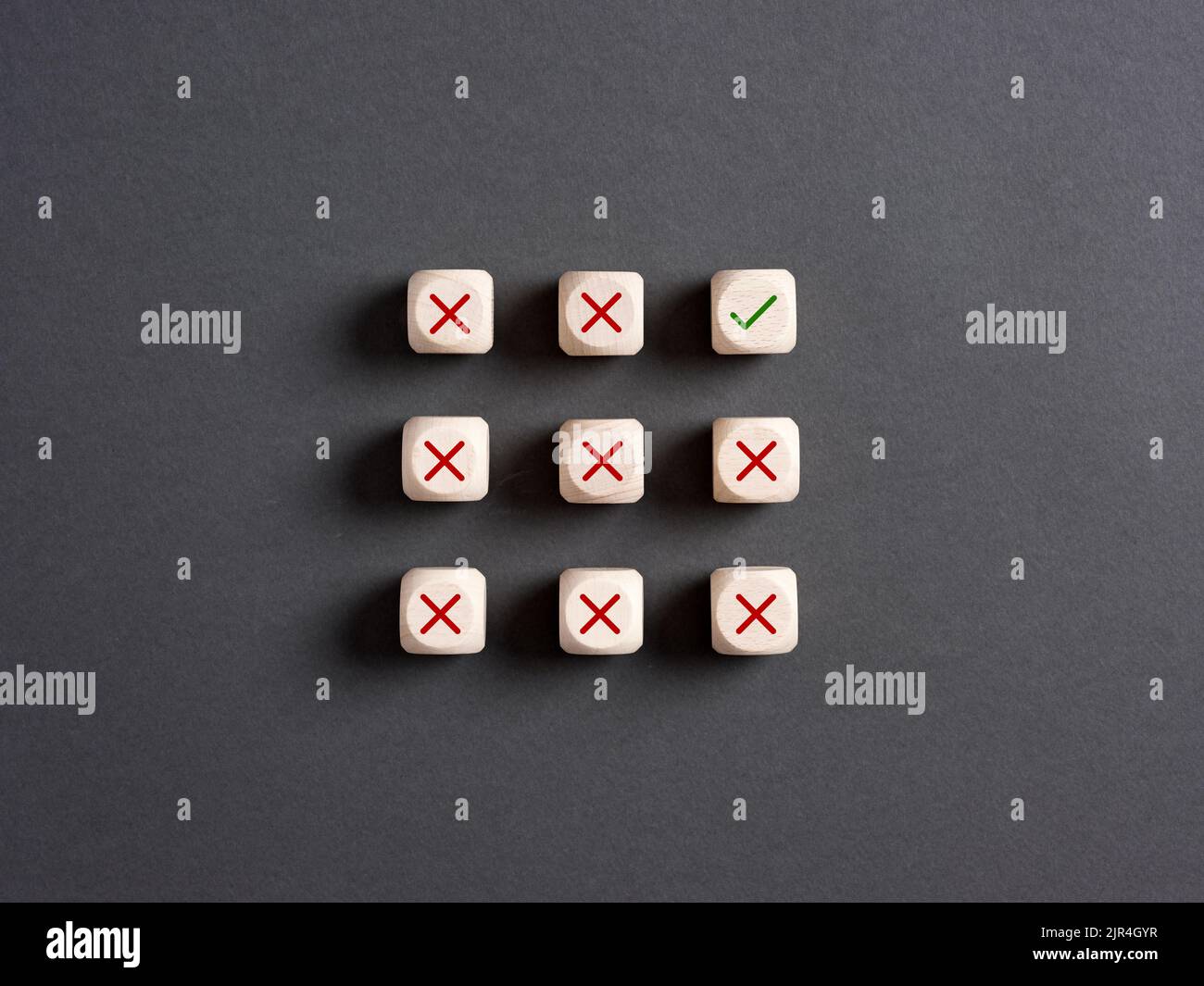 Checkmark and cross symbols on wooden cubes. Making the right choice ...