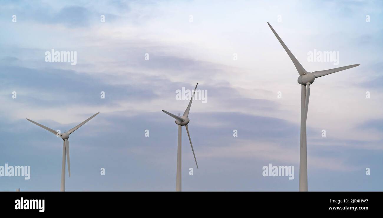 Wind turbines generating clean renewable energy Stock Photo - Alamy