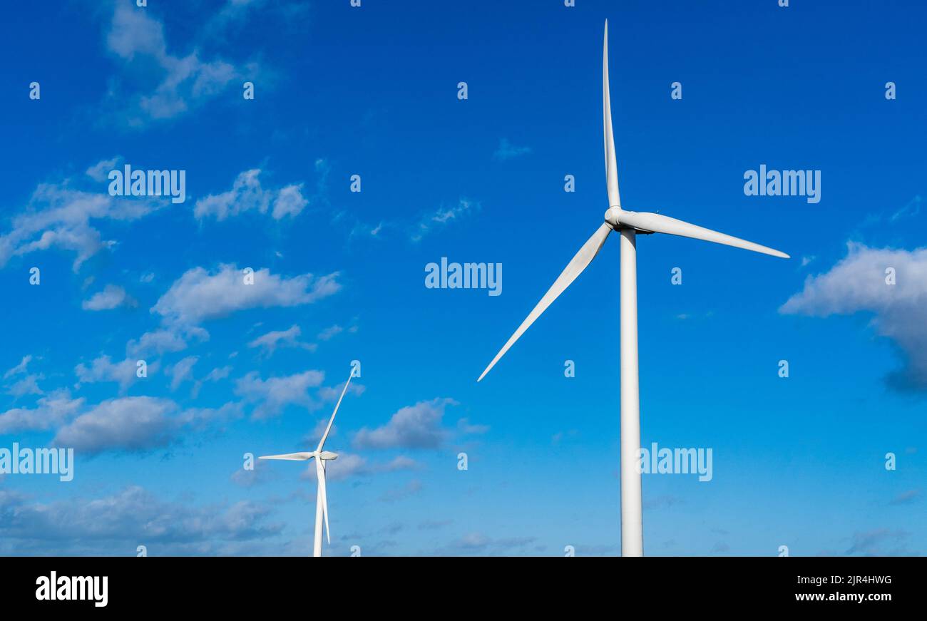 Wind turbines generating clean renewable energy Stock Photo - Alamy