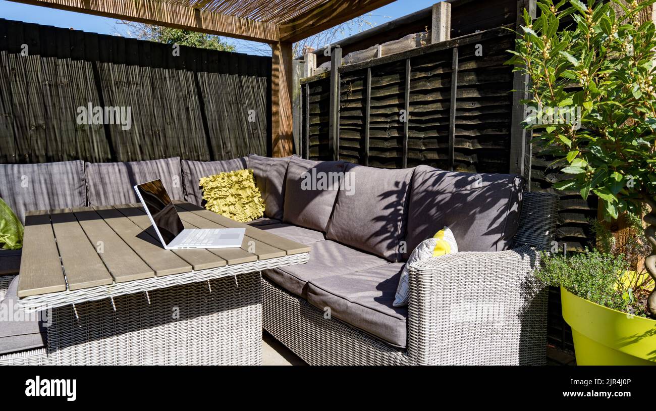 Working from home setup in a garden Stock Photo - Alamy