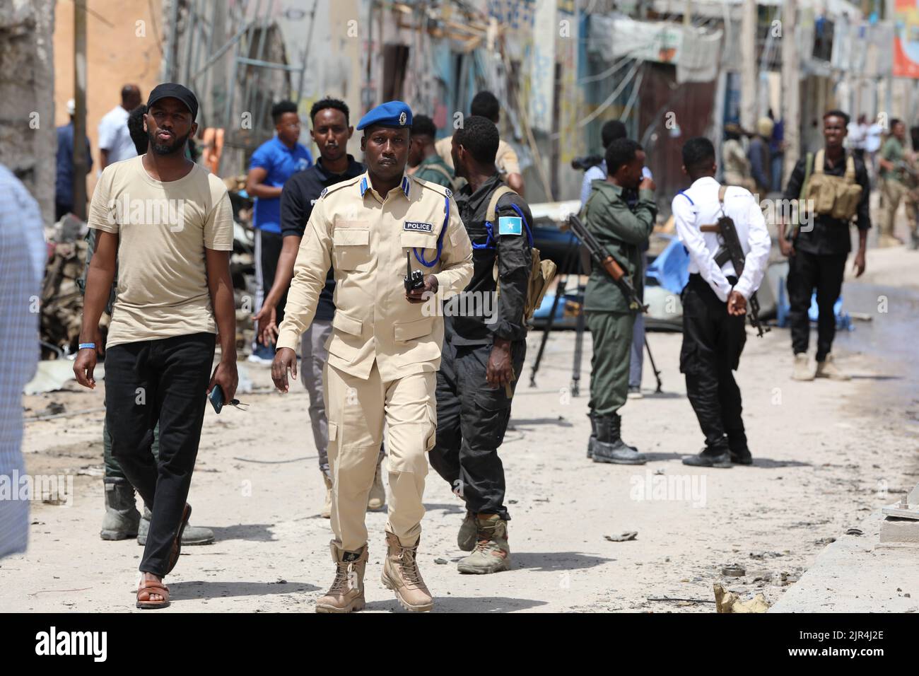 Mogadishu. 21st Aug, 2022. Policemen stand guard near the site of a ...