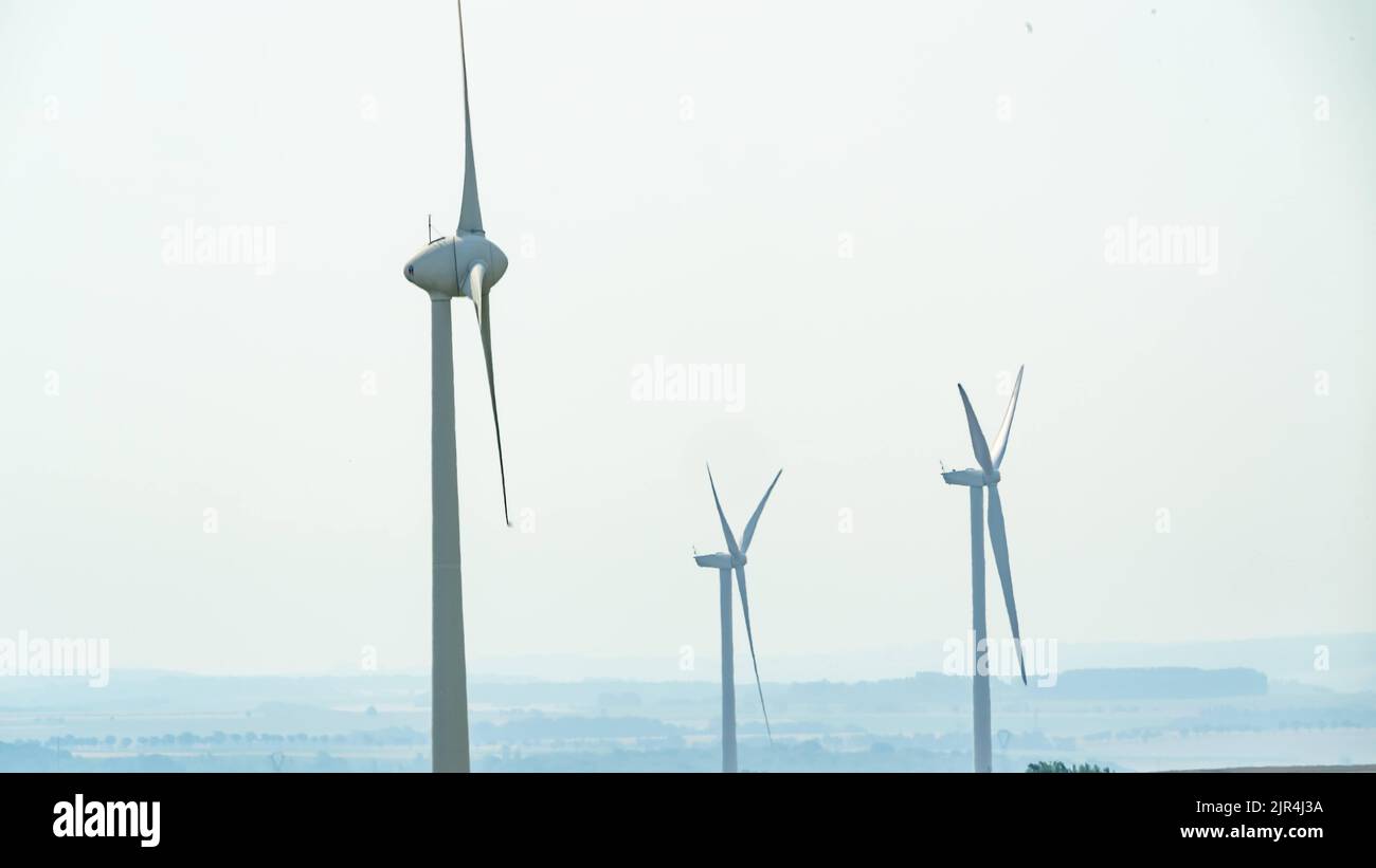 Wind turbines providing clean energy Stock Photo - Alamy