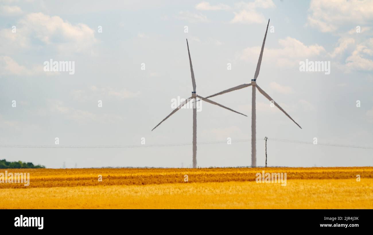 Wind turbines providing clean energy Stock Photo - Alamy