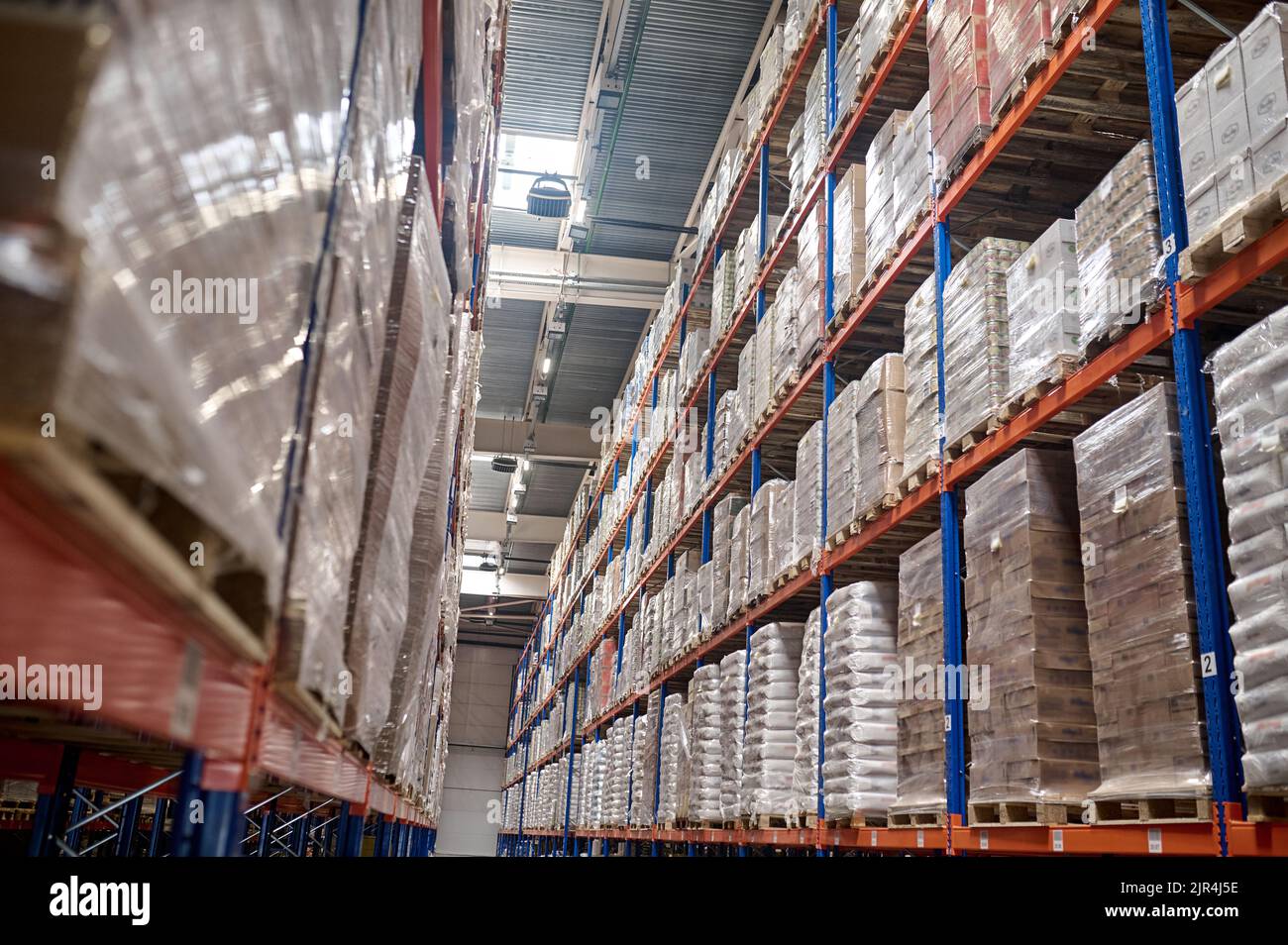 Merchandise stored in the commercial warehouse premises Stock Photo - Alamy