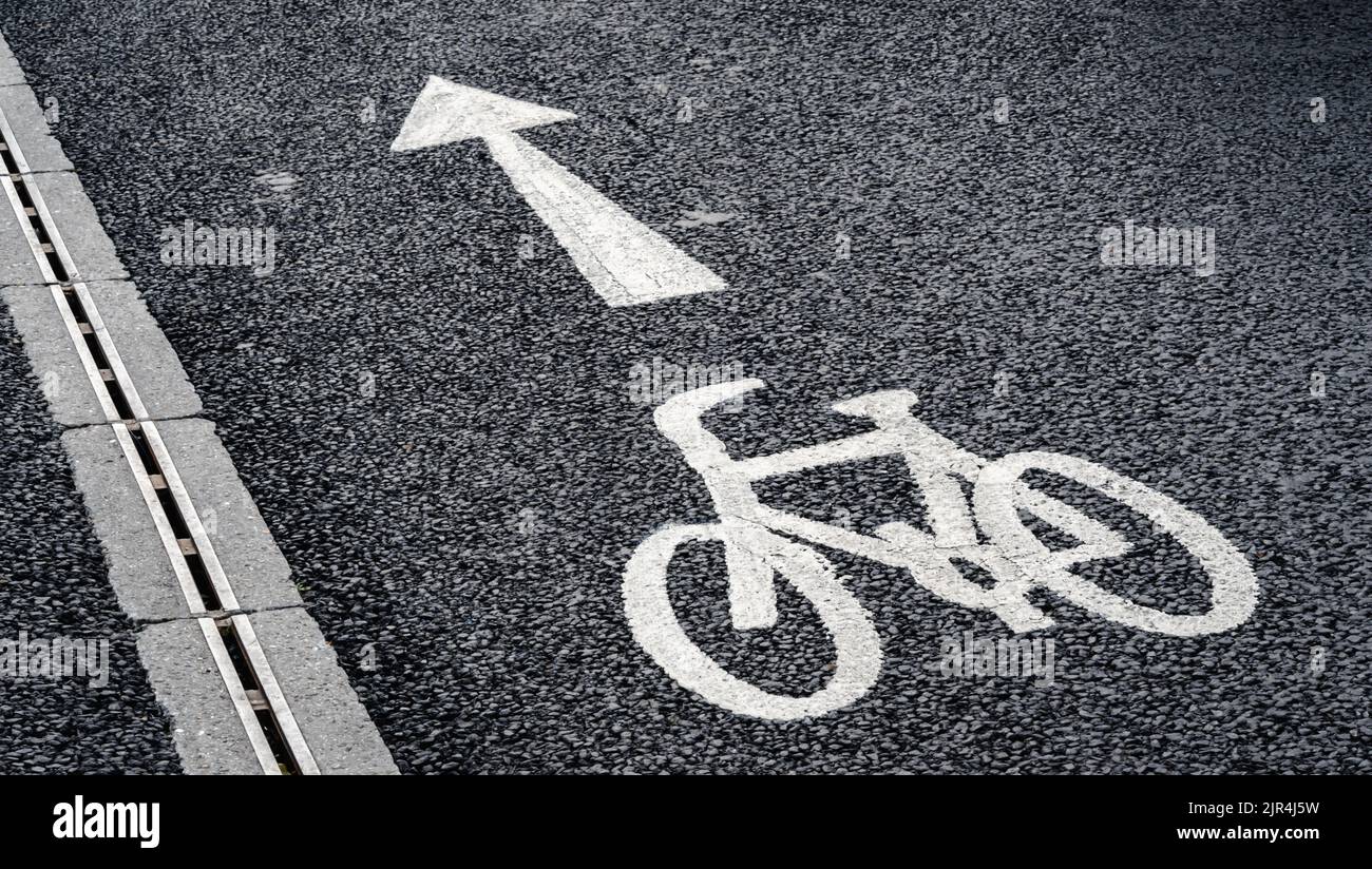 Bike symbol depicting cycle lanes Stock Photo - Alamy