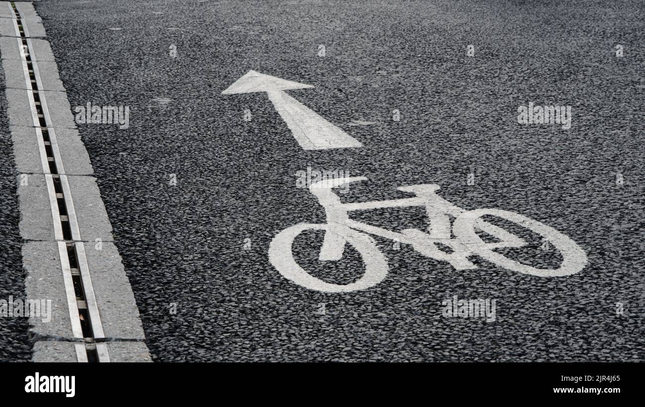 Bike symbol depicting cycle lanes Stock Photo - Alamy
