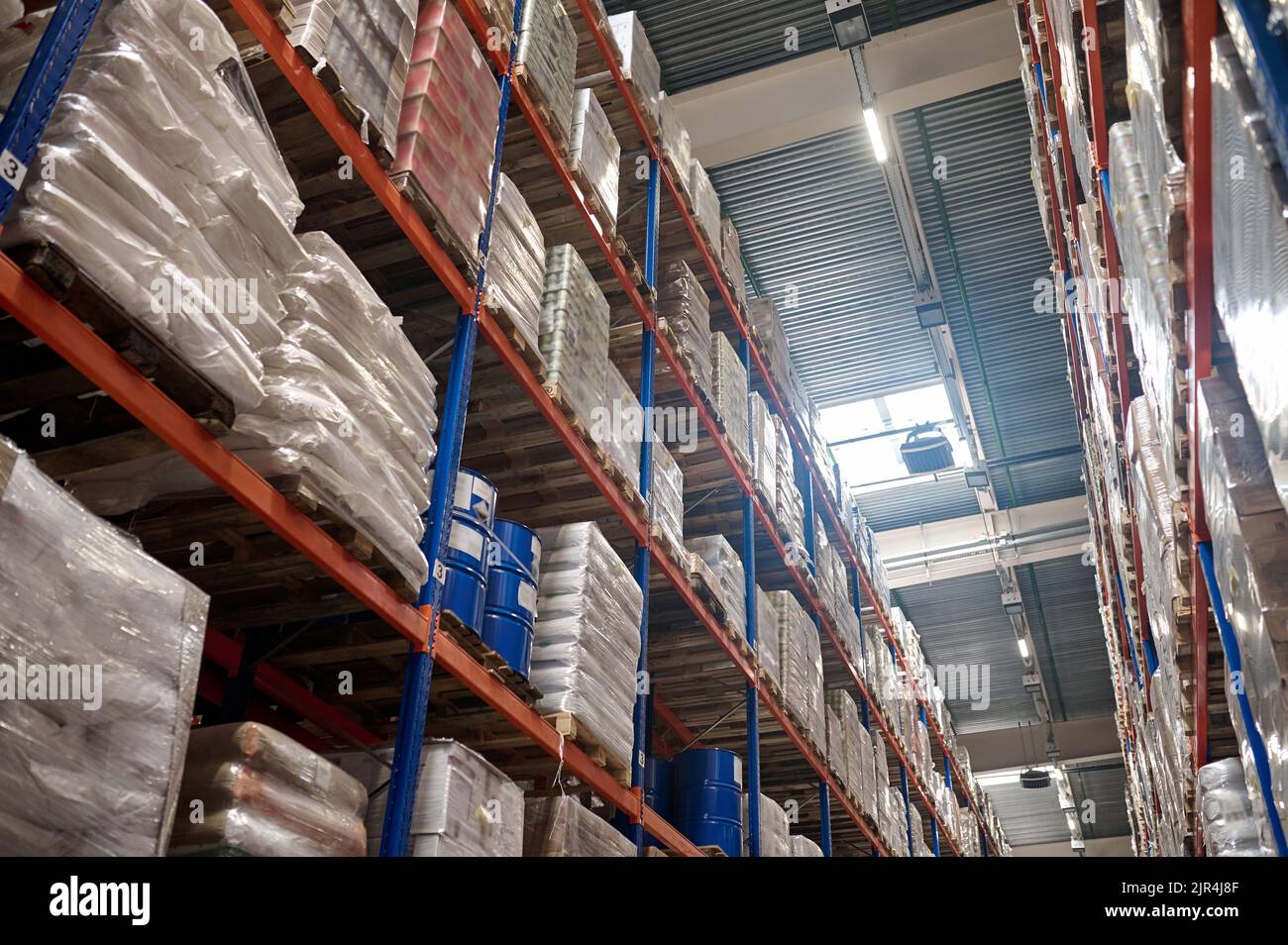 Goods stored on the shelving units in the storehouse Stock Photo - Alamy