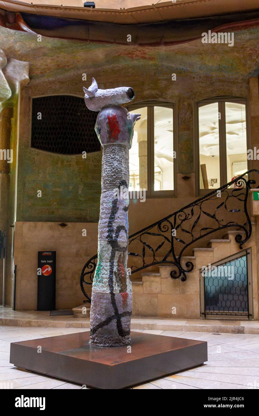 A vertical shot of a statue from the inner garden of La Pedrera (Casa ...