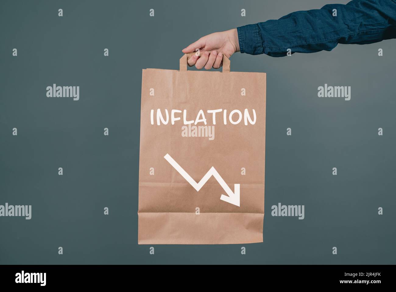 Inflation and financial crash, man holding empty shopping bag, economic ...