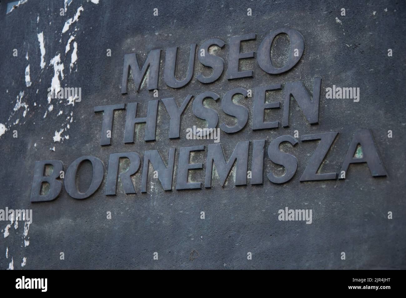 A close-up shot of the name of Thyssen Bornemisza Museum on the wall ...