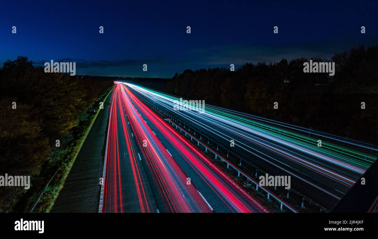 Motorway fast traffic light trails at night Stock Photo - Alamy