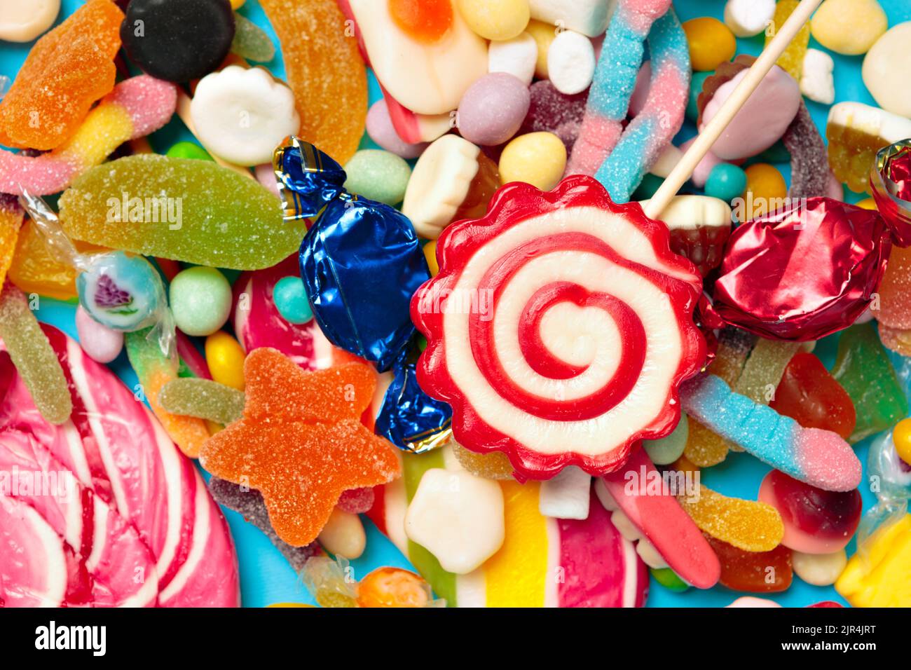 Different colorful fruit candy Stock Photo - Alamy