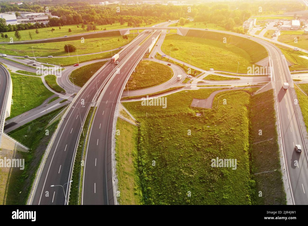Aerial view of cars driving on round intersection in city ...