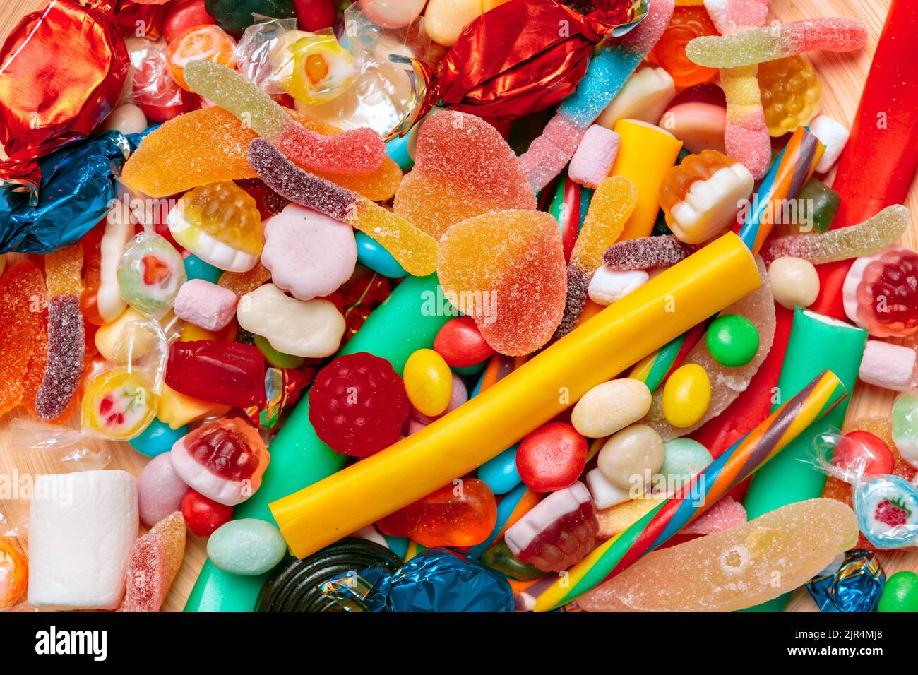 Different colorful fruit candy Stock Photo - Alamy