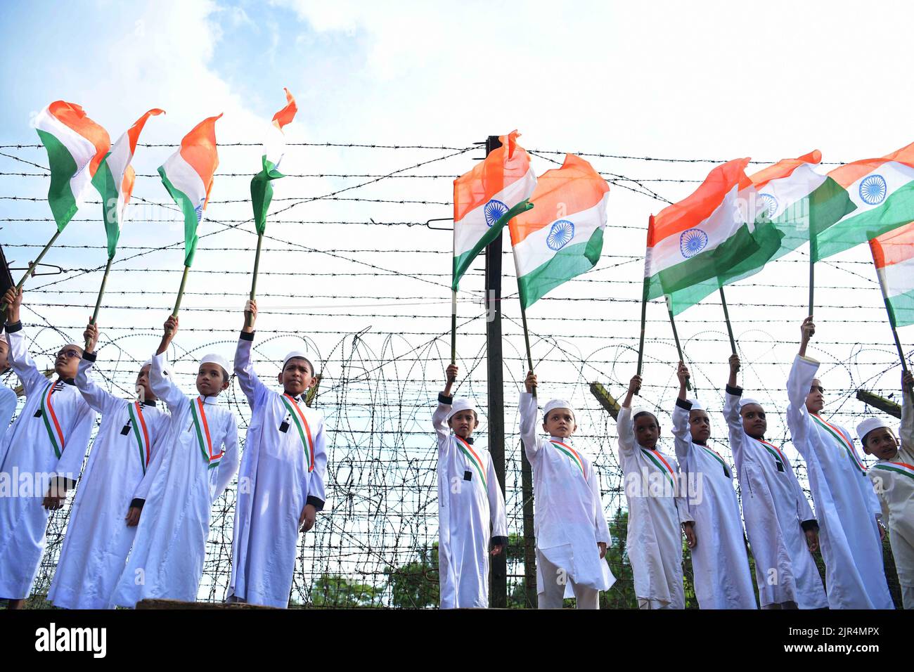 Children participate in a "Tiranga Yatra" organised by BSF (Border ...