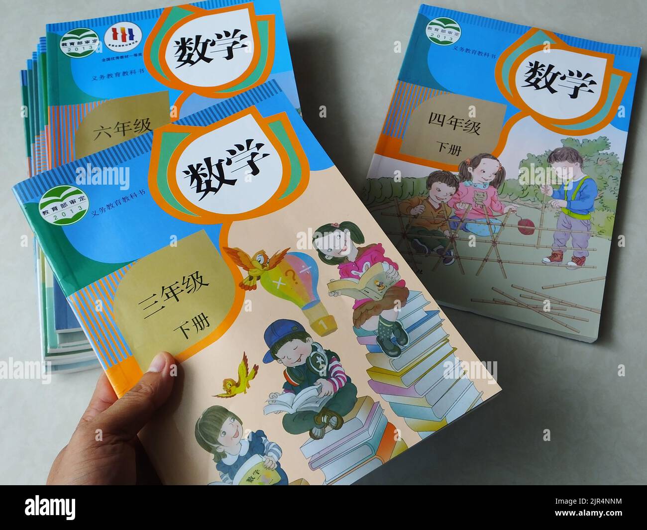 YICHANG, CHINA - AUGUST 22, 2022 - A citizen shows an illustration of a ...