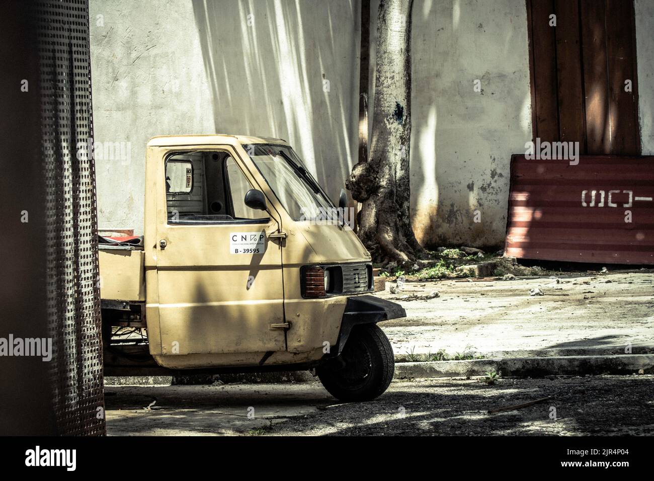 A minivan Piaggio Porter utility parked on the street Stock Photo - Alamy