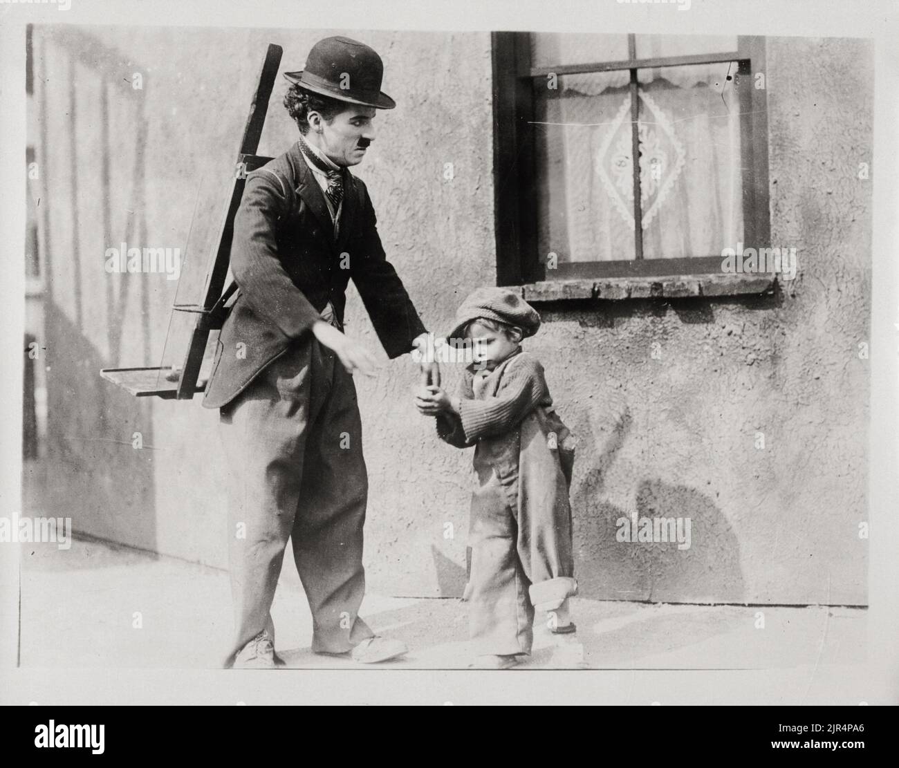 Charlie Chaplin and Jackie Coogan in "The Kid" (First National, 1920s ...