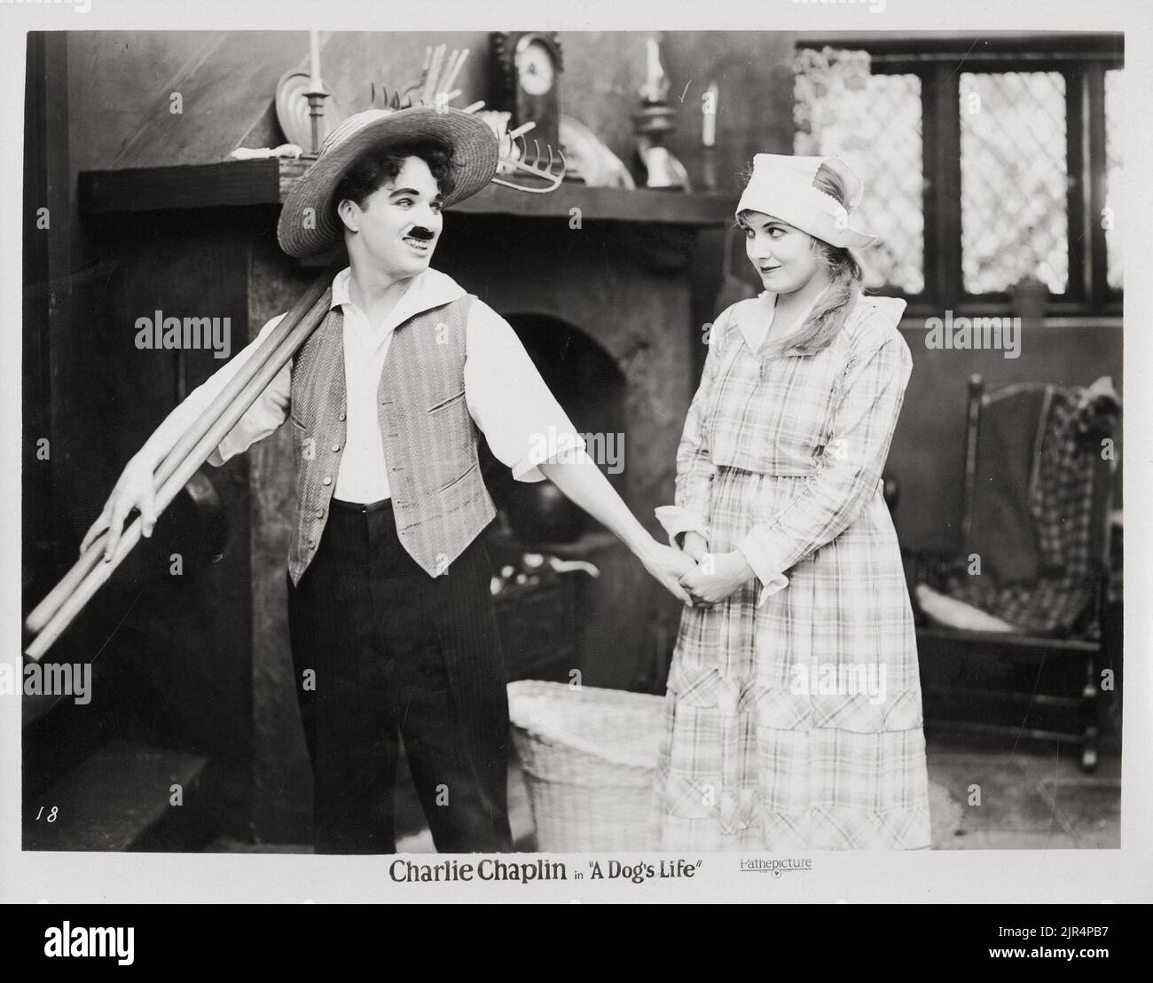 Charlie Chaplin in A Dog's Life (Pathé picture 1920s) movie scene Stock ...