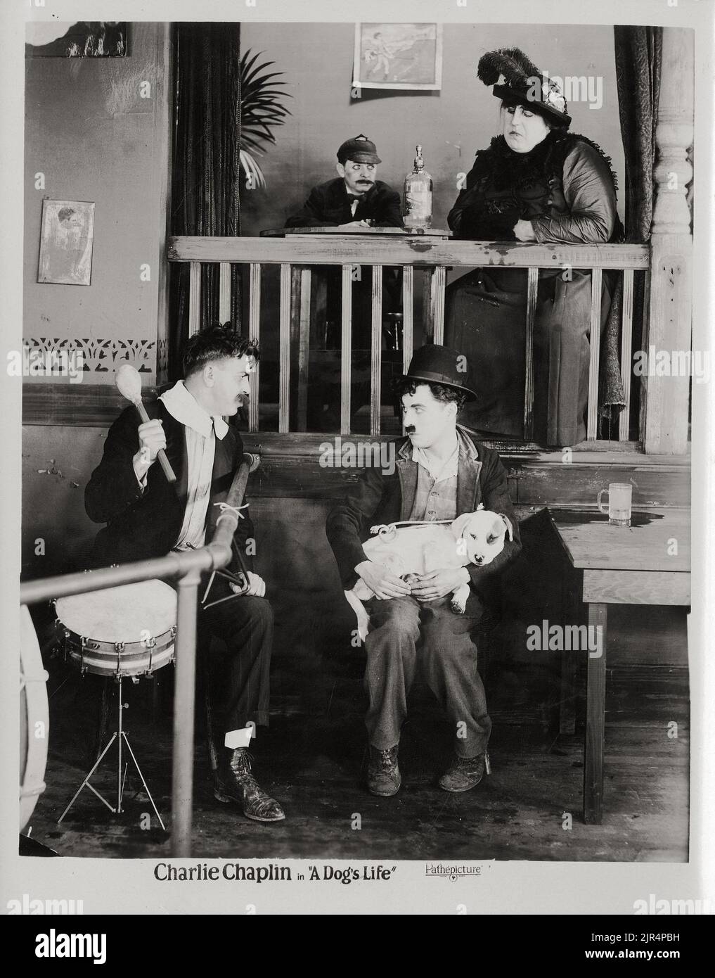 Charlie Chaplin in A Dog's Life (Pathé picture 1920s) film scene Stock ...