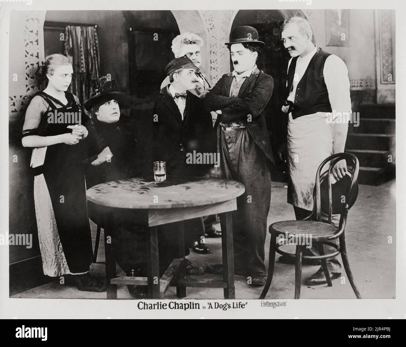 Charlie Chaplin in A Dog's Life (Pathé picture 1920s) movie scene Stock ...