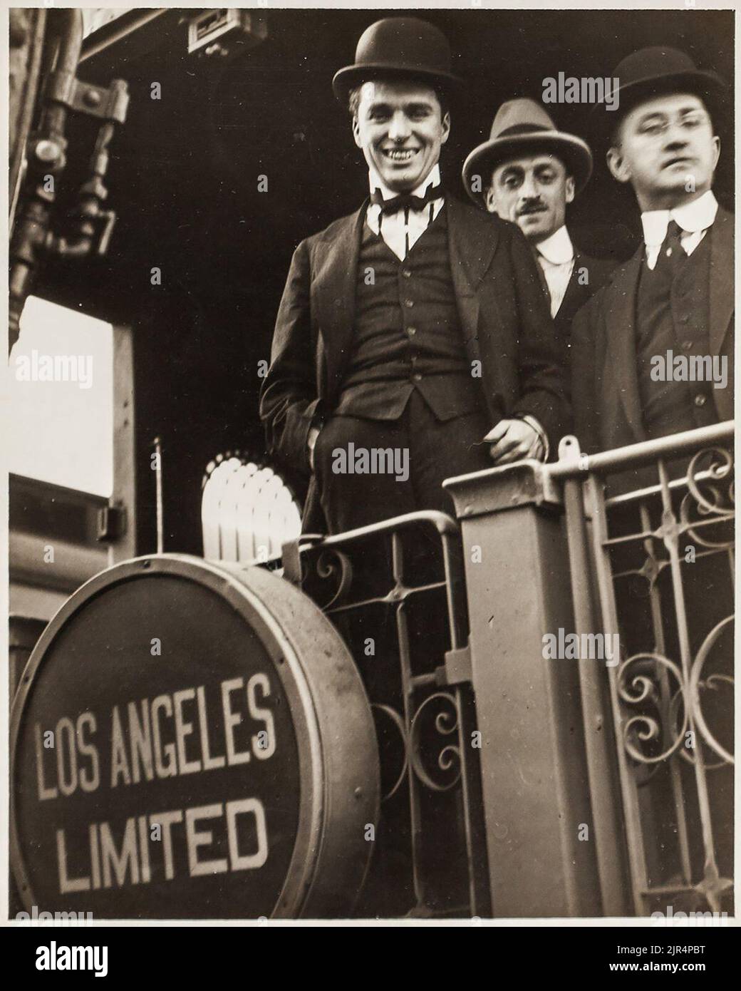 Famous silent film actor Charlie Chaplin leaving on a train, Los ...
