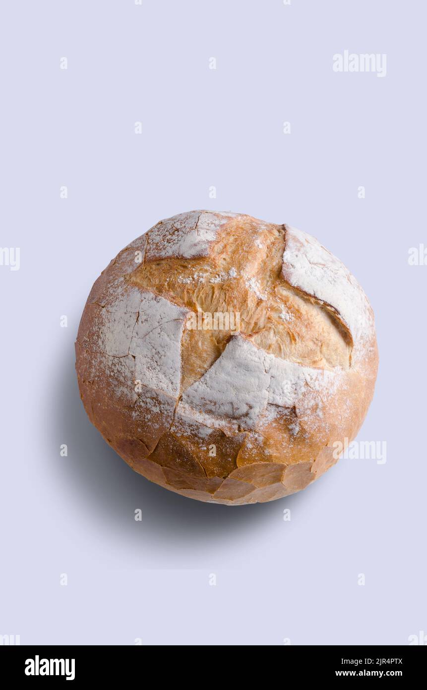 Large Coburn Cob bread on plain background with copy space at top and ...