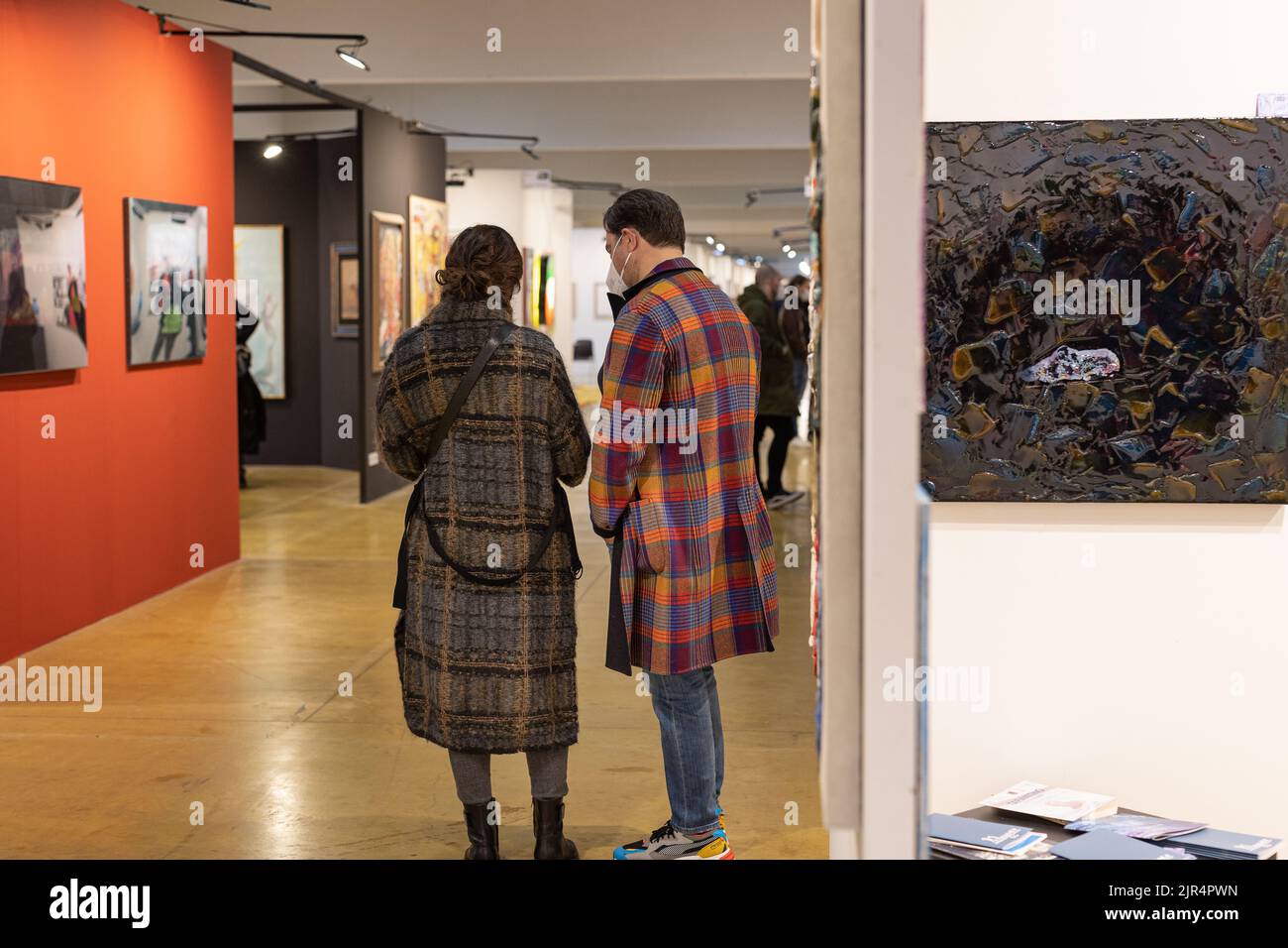 People Walking and Admiring Paintings in a Modern Art Gallery Stock ...
