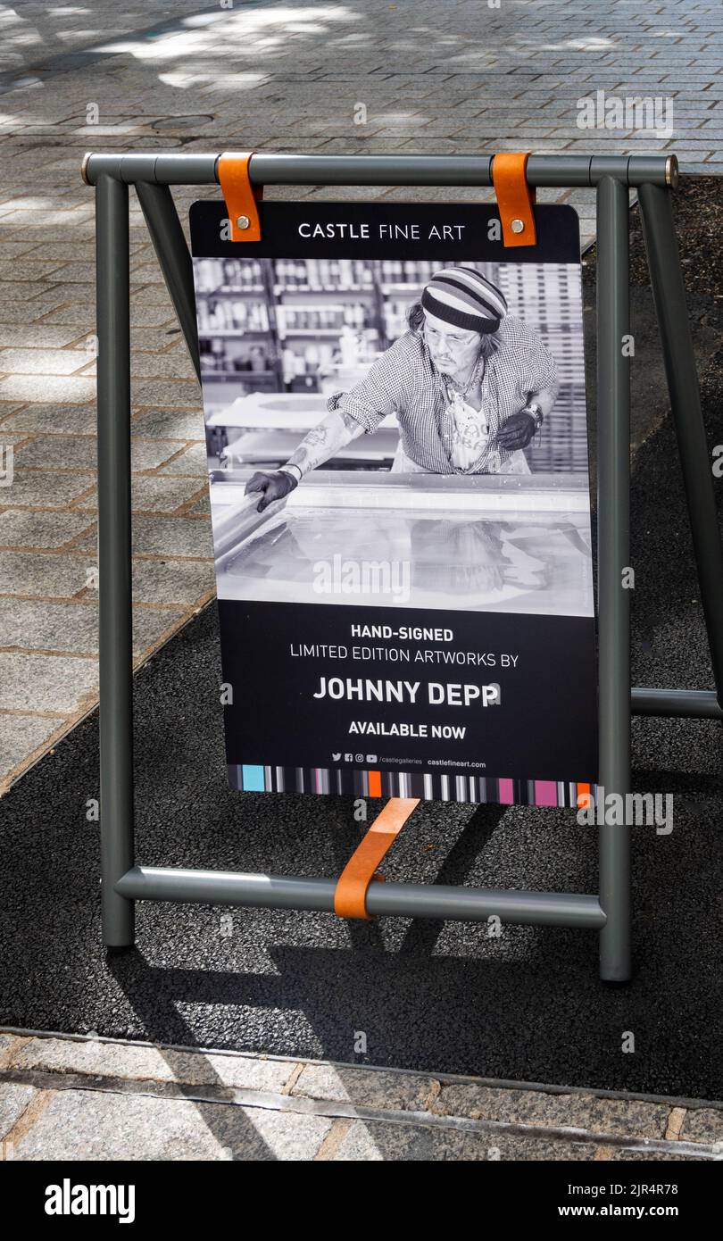 Hanging sign announcing Johnny Depp art outside Castle Fine Art Gallery ...