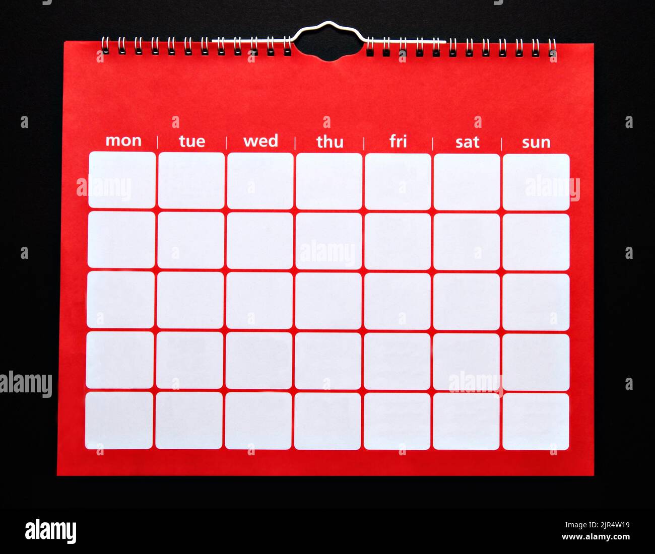 Plain red monthly calendar Add your own numbers Stock Photo - Alamy