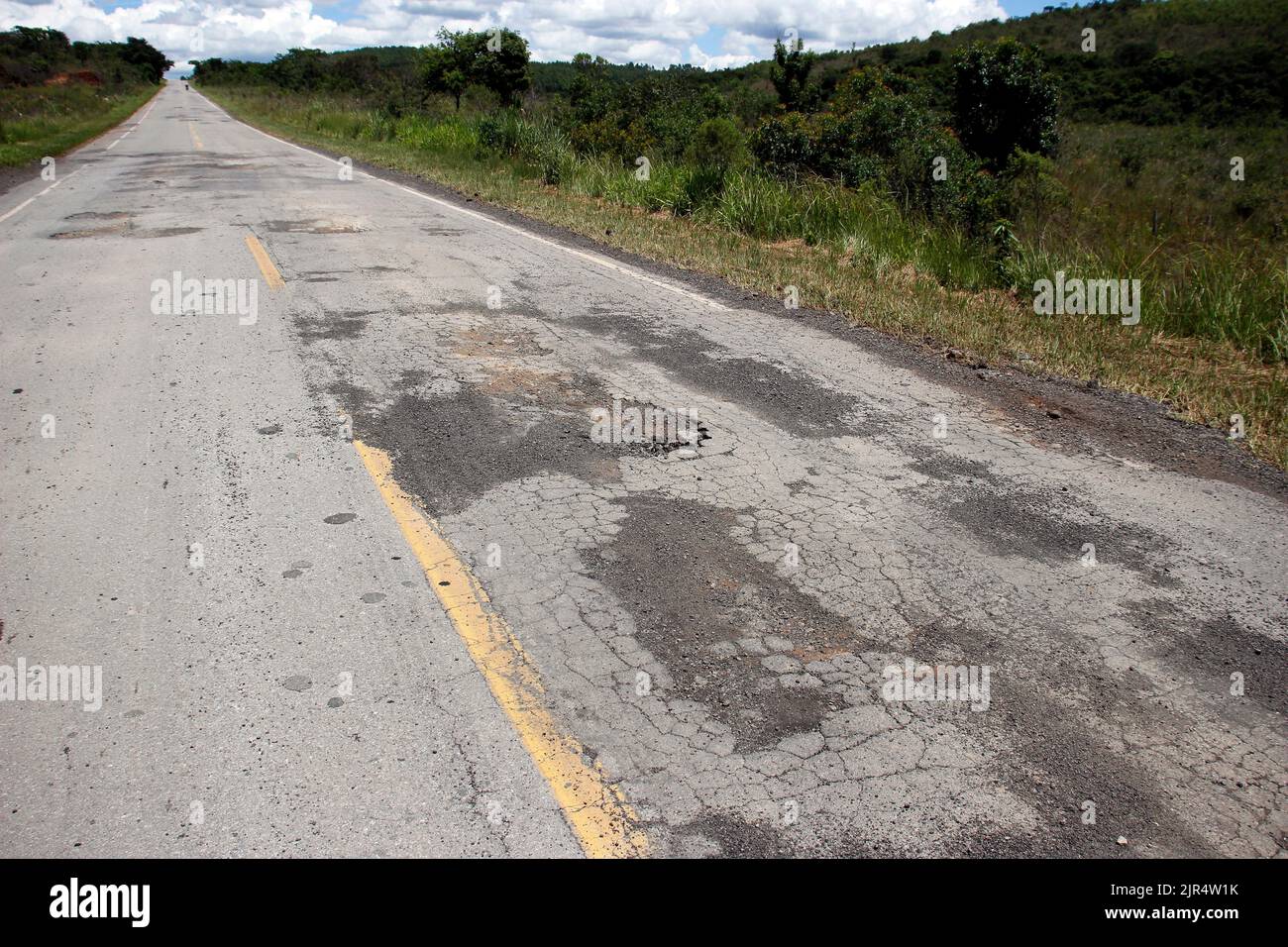 highway roof with defective and spoiled asphalt, dangerous for traffic ...