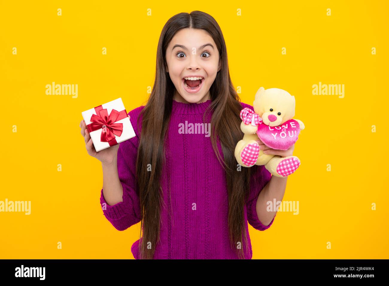 Excited kids face. Teenager child with present box. Teen girl giving ...