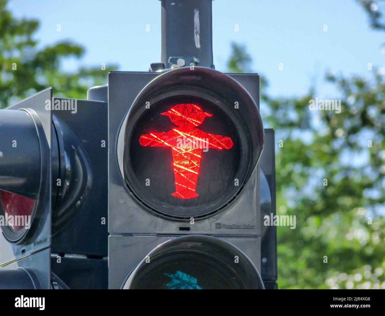 A closeup of a creative red man pedestrian traffic light Stock Photo ...