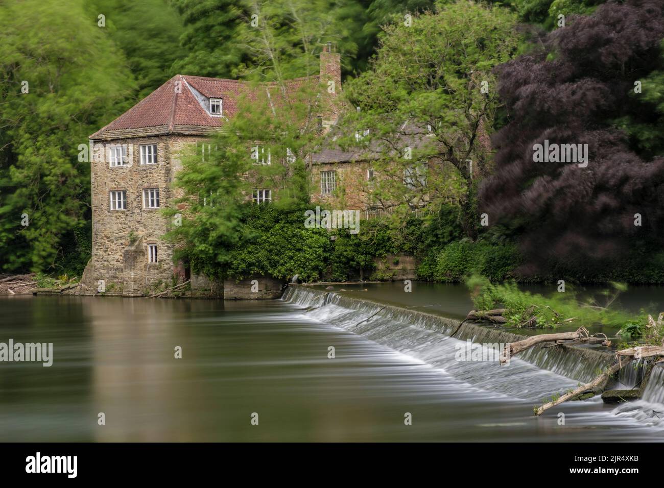 Long exposure shot of old fulling mill under Durham Cathedral Stock ...