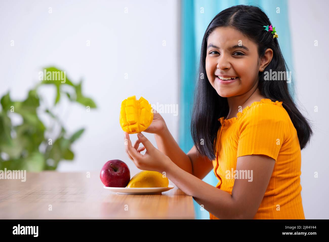 Mango girl hi-res stock photography and images - Alamy