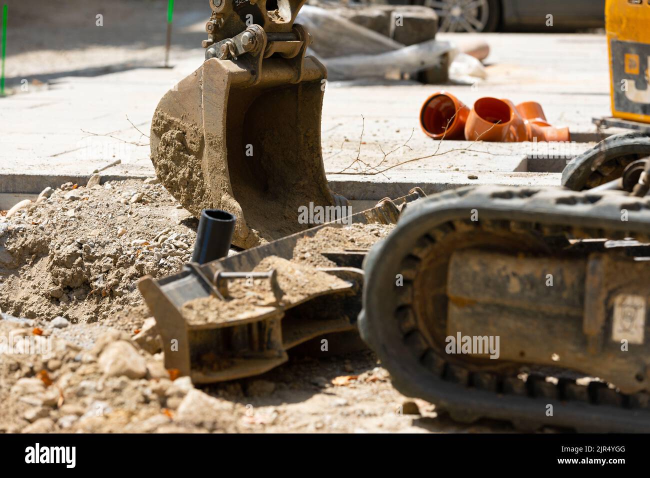 Picture of an excavators machine in construction site Stock Photo - Alamy