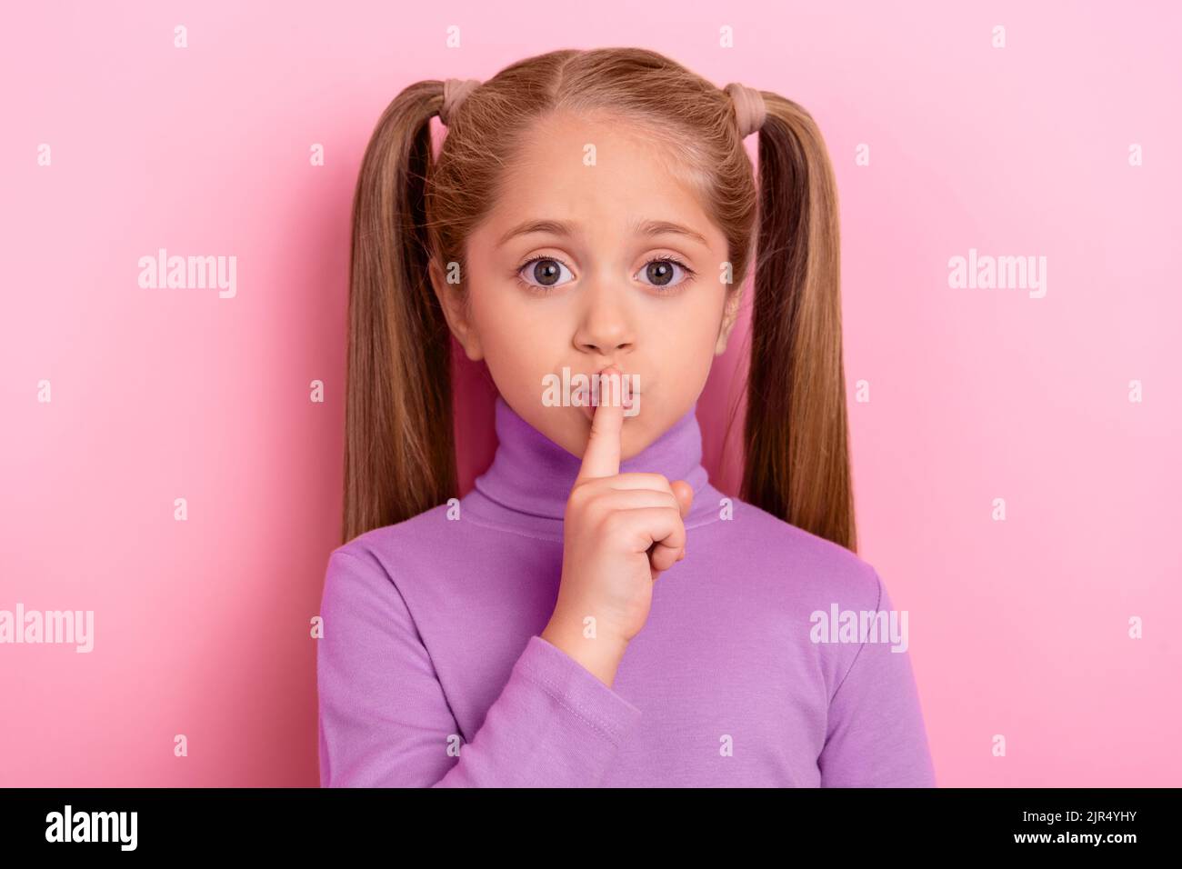 Portrait of young pretty serious girl ask you to be quiet keep silence ...