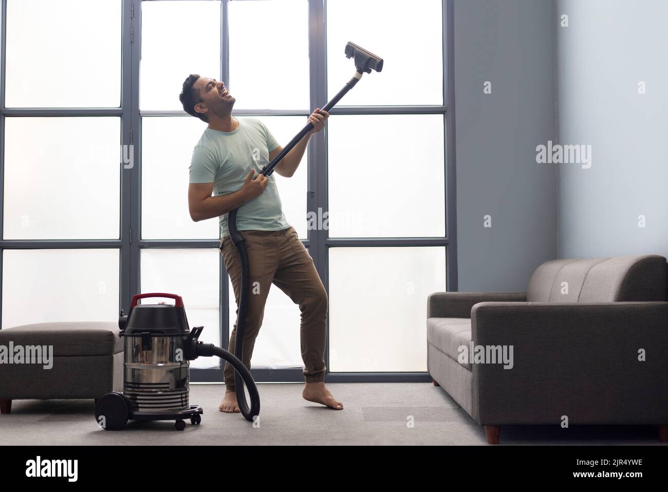 Indian male cleaner cleaning hi-res stock photography and images - Alamy