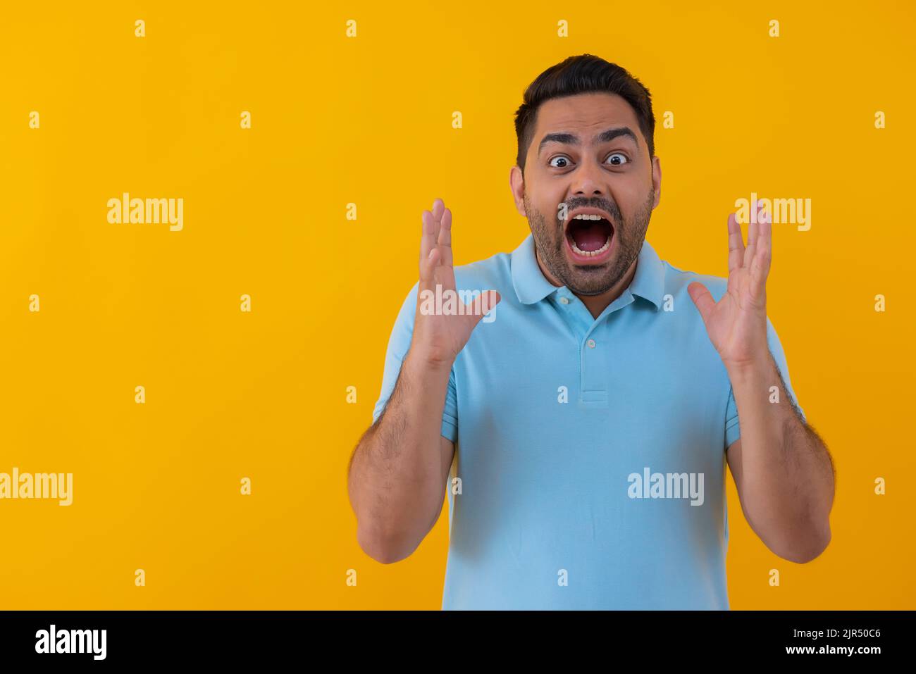 Angry man shouting hands raised hi-res stock photography and images - Alamy