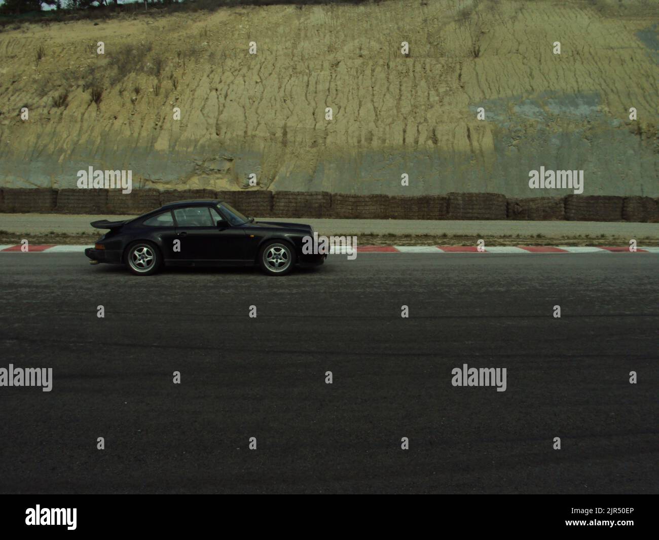 A modern Germany fast car Porsche 911 driving in race Stock Photo - Alamy