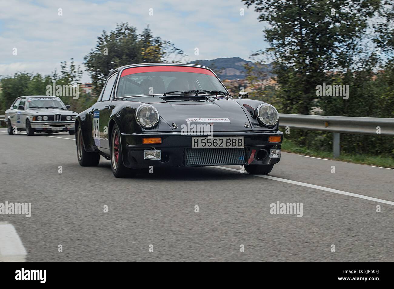 A modern Germany fast car Porsche 911 driving in race Stock Photo - Alamy